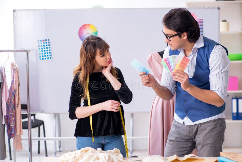 Tailor is teaching student stock photo. Image of cloth - 174038530