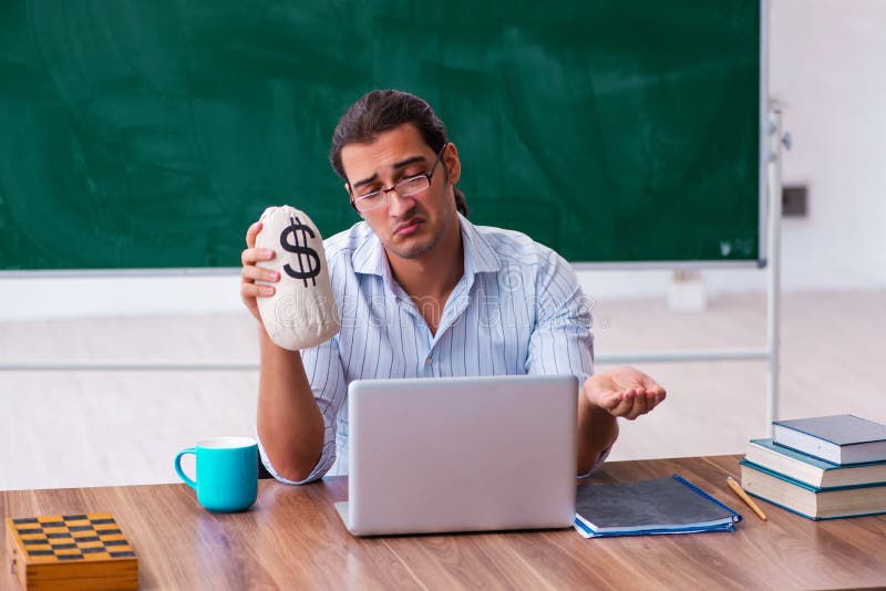 Young Male Teacher in Remuneration Concept Stock Photo - Image of ...