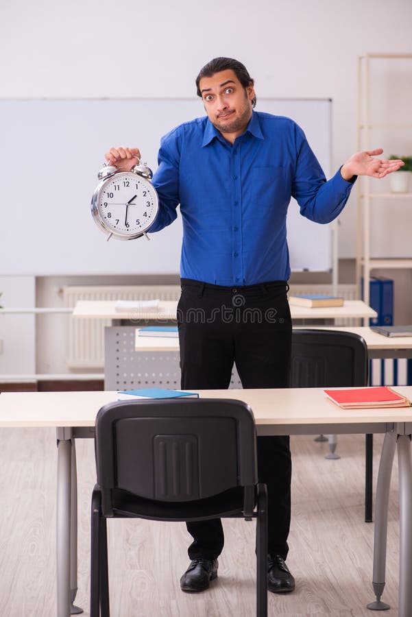 Young Male Teacher in Time Management Concept Stock Image - Image of ...