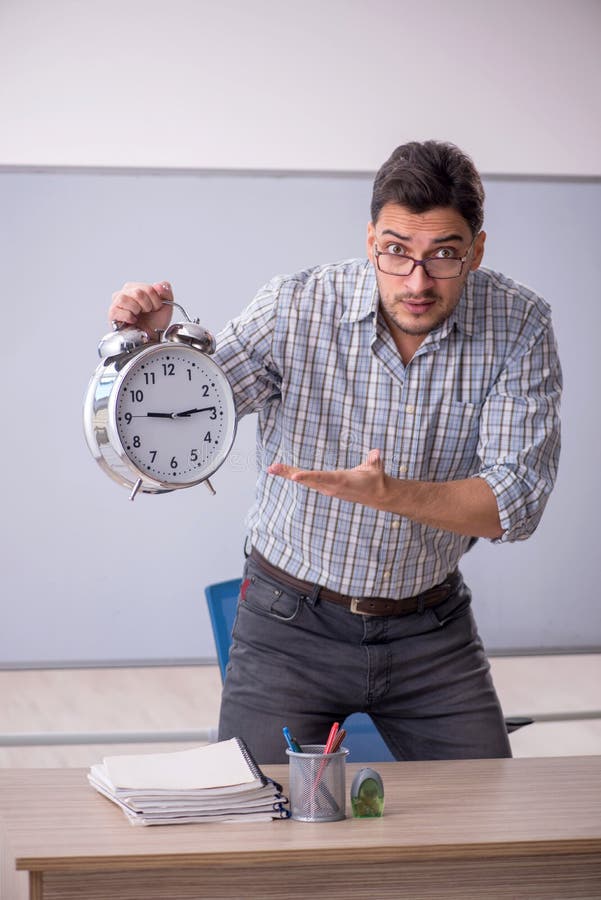 Young Male Teacher in Time Management Concept Stock Image - Image of ...