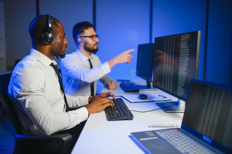 Young Male Technical Support Dispatchers in Call Center Stock Image ...