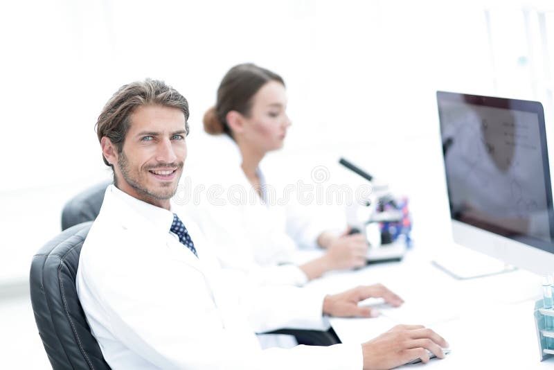 Young Male Technician Working on Computer in Laboratory Stock Photo ...