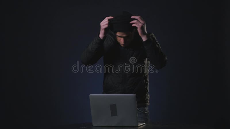 Young Male Thief Stealing Data from Computer Stock Photo - Image of ...