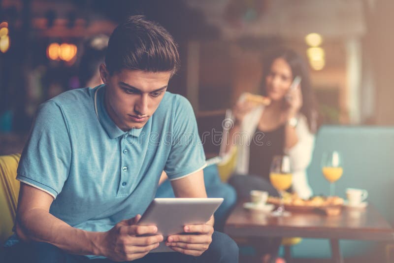 Young Male Using Digital Tablet in Modern Startup Office Stock Image ...