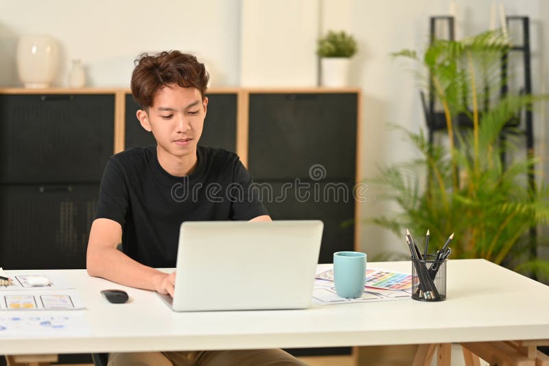 Young Male Web Developer Planning Application Template Layout Framework ...