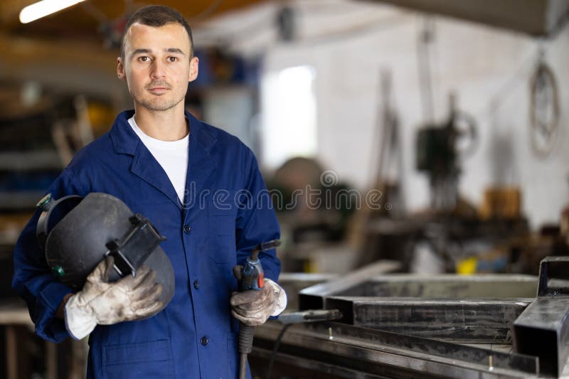 Young Male Welder Posing in Workshop Stock Image - Image of ...