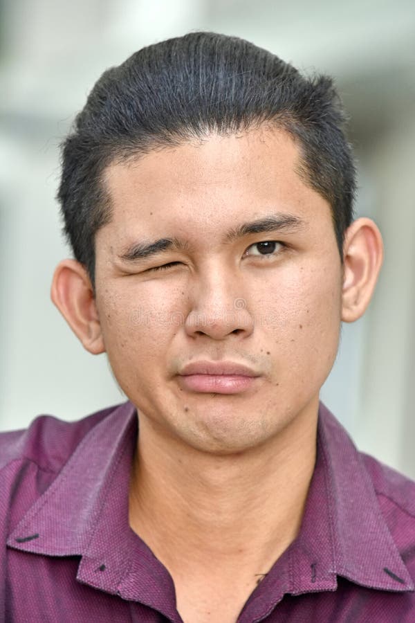 Young Male Winking stock photo. Image of wink, winking - 128411458