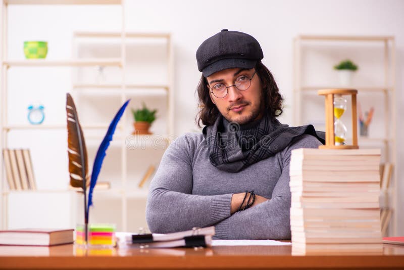 Young Male Writer in Time Management Concept Stock Image - Image of ...