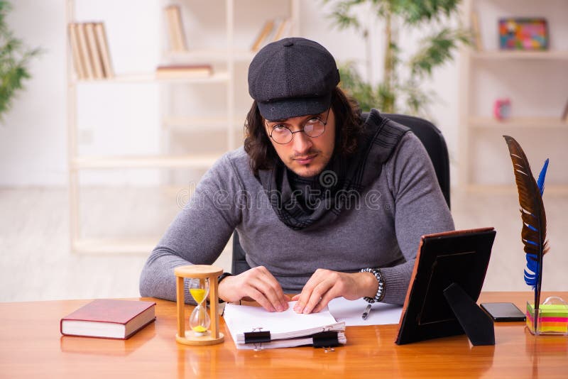 Young Male Writer in Time Management Concept Stock Photo - Image of ...