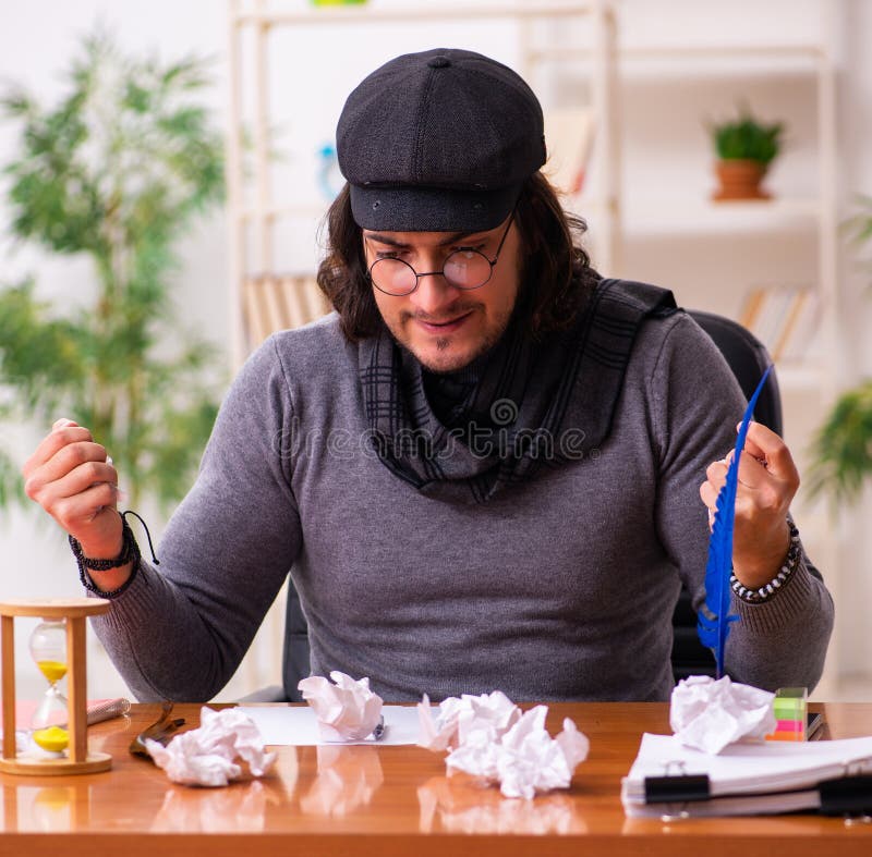 Young Male Writer in Time Management Concept Stock Image - Image of ...