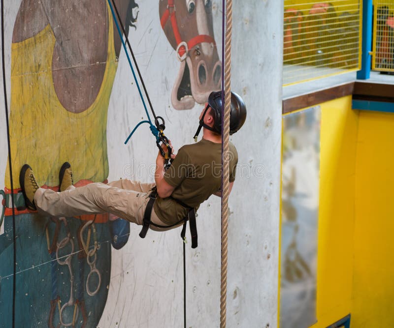 Young Man Abseiling editorial stock image. Image of instruction - 97444829
