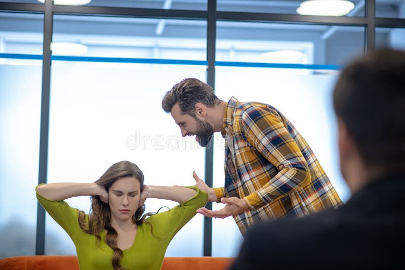 Young Man Angrily Yelling at His Wife Stock Photo - Image of longhaired ...