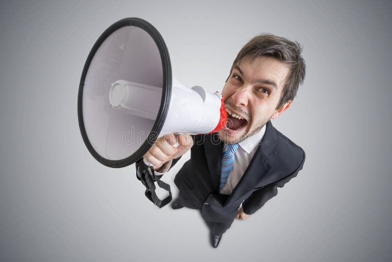 Young Man is Announcing a Message with Megaphone. View from Above Stock ...