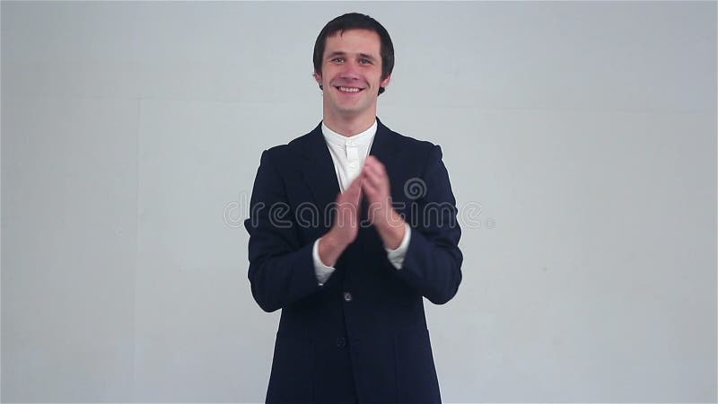 Young man applauding. stock footage. Video of gesture - 79561156