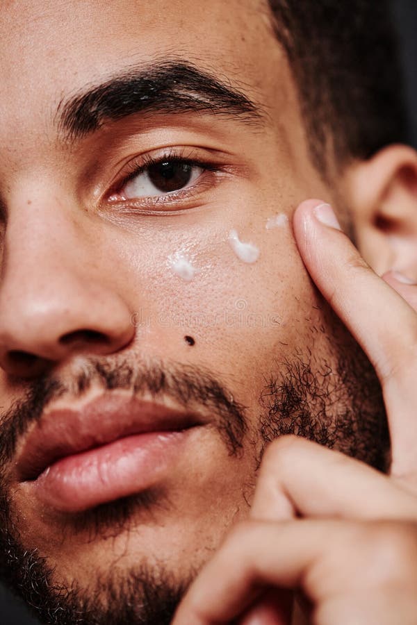 Young Man Applying Cream on His Face Stock Image - Image of skincare ...