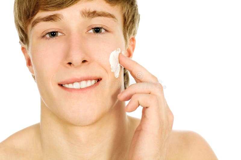 Young Man Applying Face Cream Stock Image - Image of applying, face ...