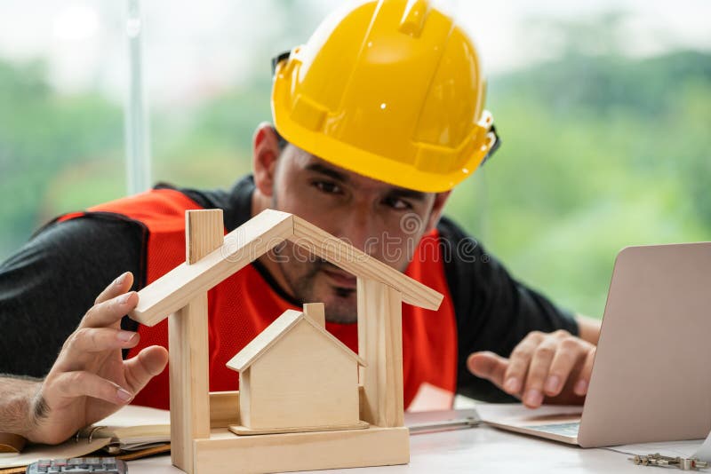 Young Man Architect or Engineer Working at Desk. Stock Image - Image of ...