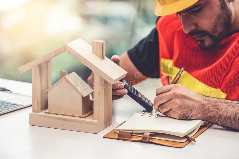Young Man Architect or Engineer Working at Desk. Stock Photo - Image of ...