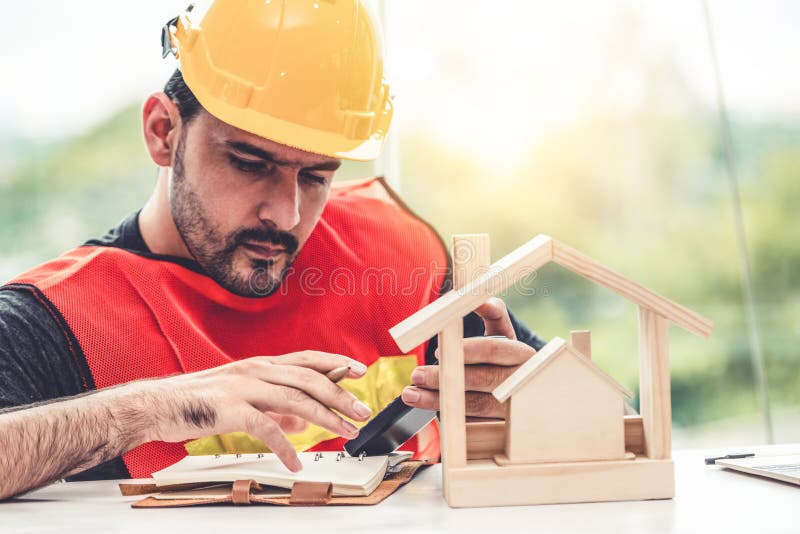 Young Man Architect or Engineer Working at Desk. Stock Image - Image of ...
