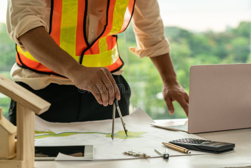 Young Man Architect or Engineer Working at Desk Stock Photo - Image of ...