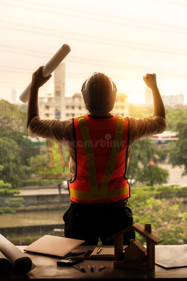 Young Man Architect or Engineer Working at Desk. Stock Image - Image of ...