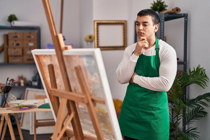 Young Man Artist Looking Draw with Doubt Expression at Art Studio Stock ...