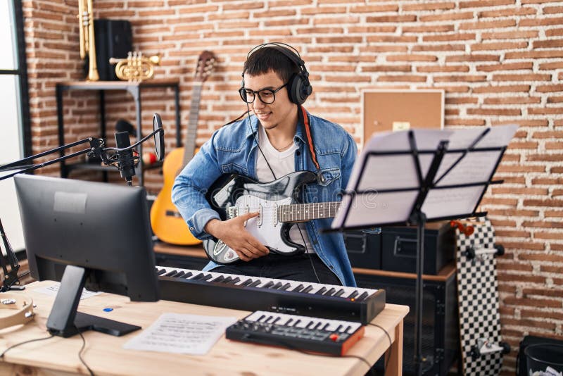 Young Man Artist Playing Electrical Guitar at Music Studio Stock Image ...