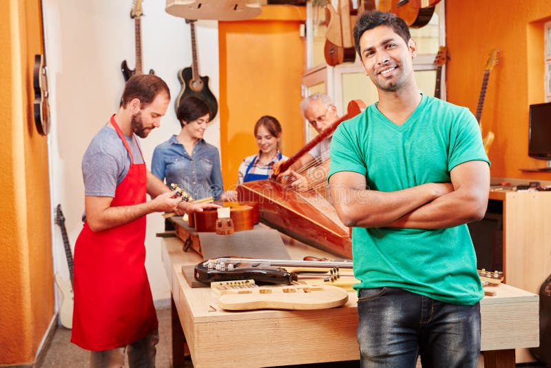 Young man as apprentice stock photo. Image of carpenter - 120482548
