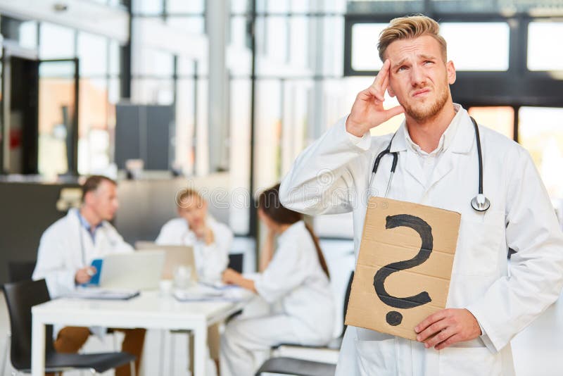 Young Man As a Doctor with Question Mark Stock Image - Image of doubt ...