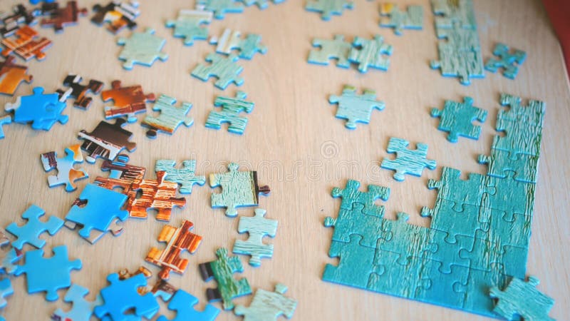 Young Man Assembling Puzzle, Cognitive Development. Puzzle Medium Skill ...
