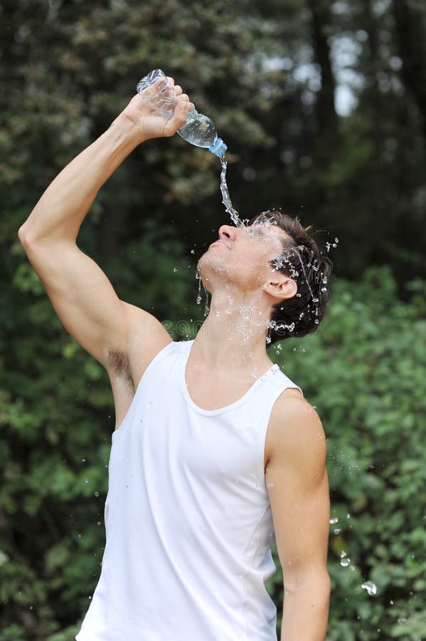 Young Man Athlete Refresh Himself Stock Image - Image of real, 3035: ...