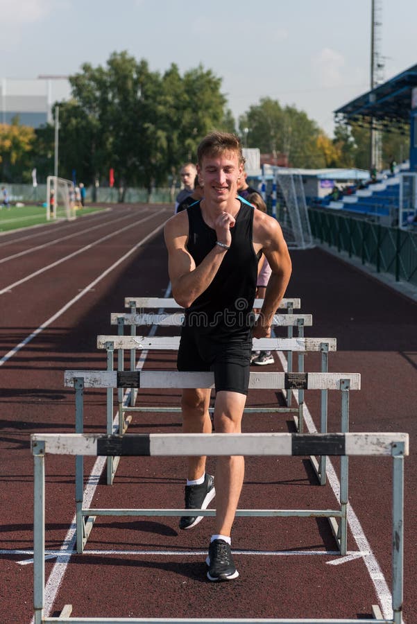 Young Man Athlete Runnner Running Hurdles Stock Image - Image of ...