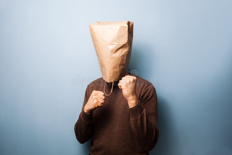 Young Man with Bag Over His Head in Fighting Stance Stock Photo - Image ...