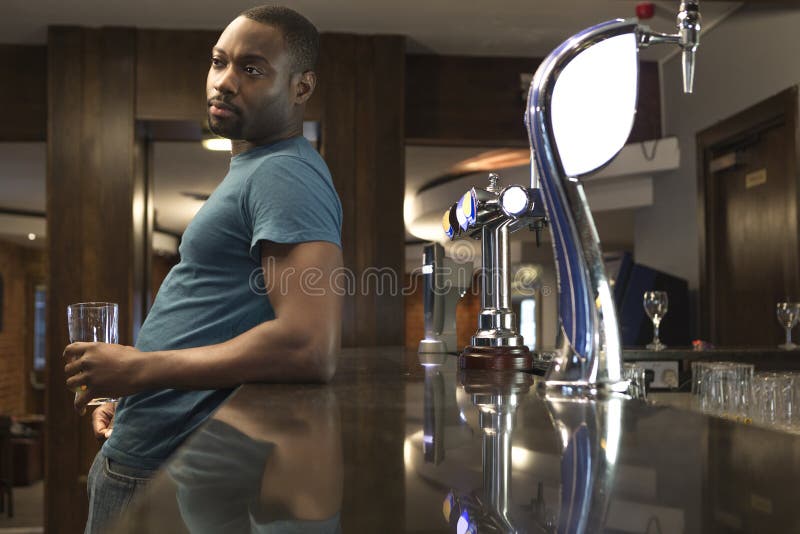 Young man at the bar stock photo. Image of waiting, bevarage - 66127866