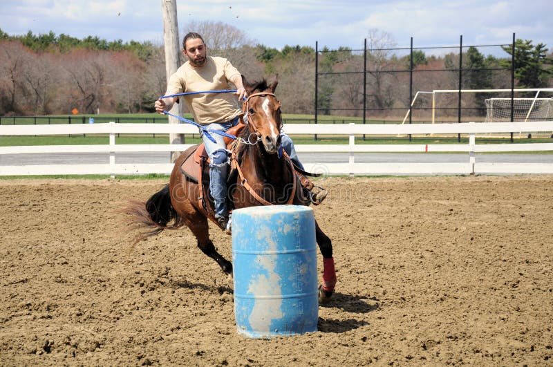 Young man barrel racing stock photo. Image of equestrian - 19232960