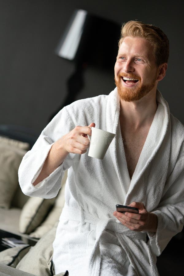 Young Man in Bathrobe Drinking Coffee at Home Stock Photo - Image of ...