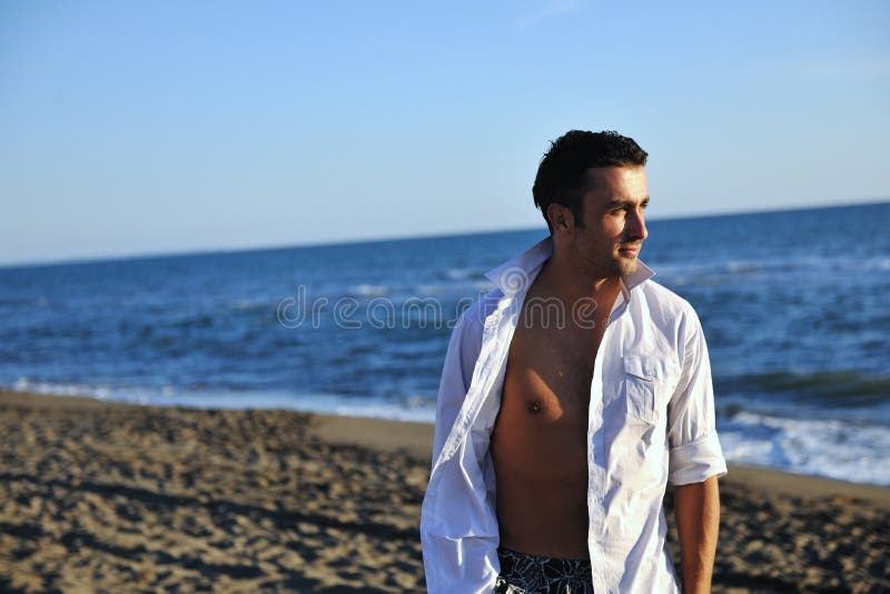 Portrait of Cute Young Man on the Beach, Blue Sky Stock Image - Image ...