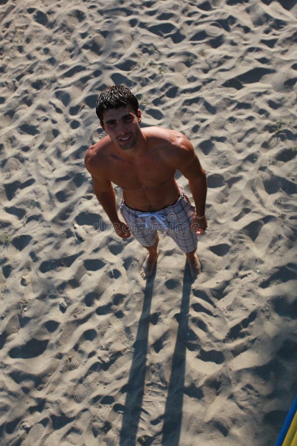 Young man on the beach stock photo. Image of outdoor - 90209178