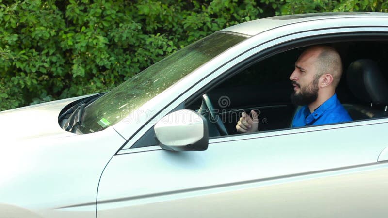 Young Man with Beard Dancing and Singing Inside His Passenger Ca Stock ...