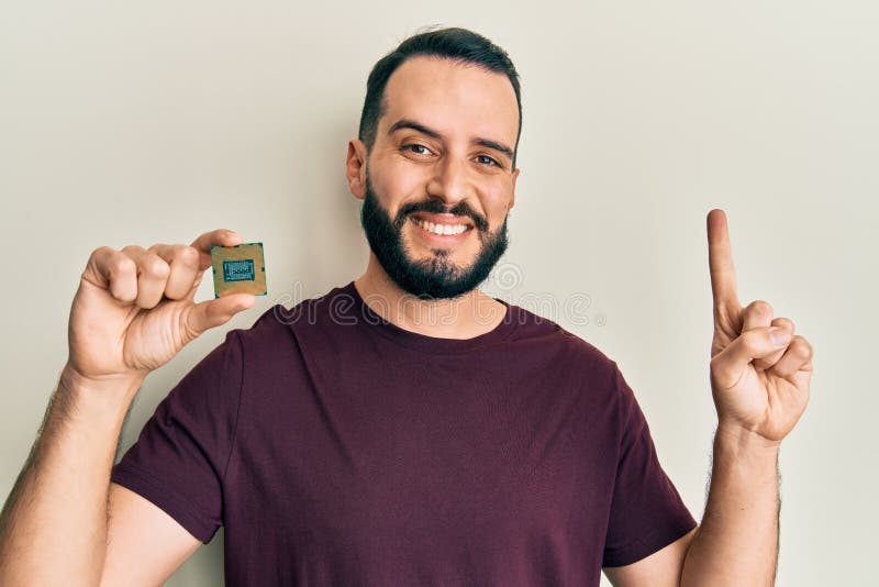 Young Man with Beard Holding Cpu Computer Processor Smiling with an ...