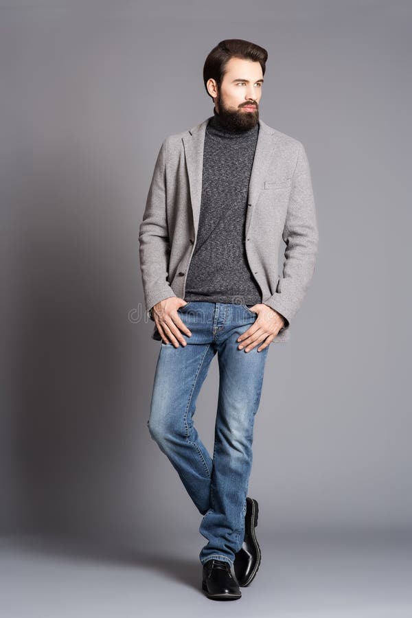 Smiling Confident Hipster Wearing Blue Tracksuit Jacket and Tight Jeans ...