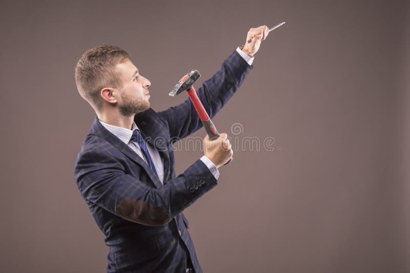 Young Man Beats Hammer on the Chisel Stock Image - Image of ...