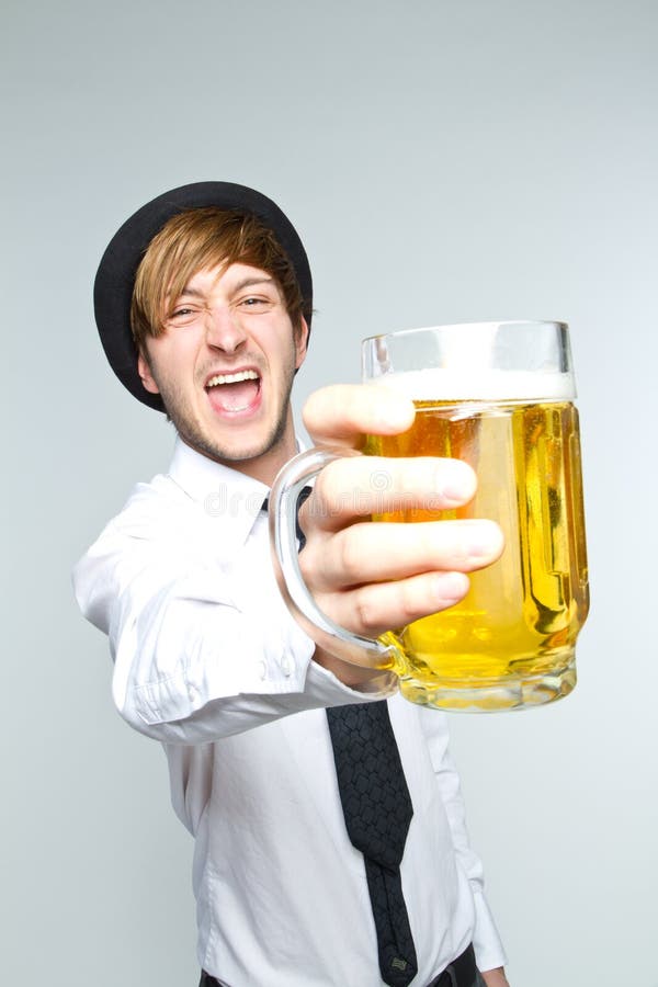 Young man with beer stock image. Image of isolated, glass - 19292953