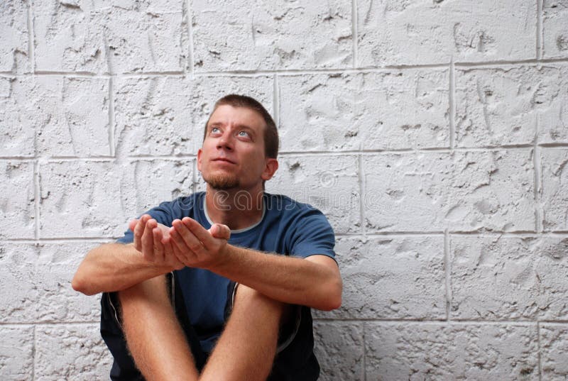 Young Man Begging stock photo. Image of hidden, distress - 6714610