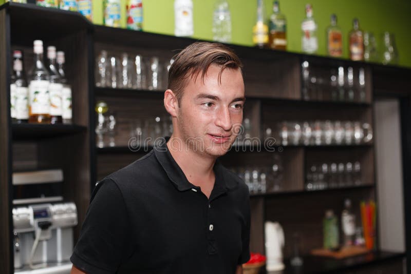 The Young Man Behind the Bar. Stock Image - Image of ethnicity, glass ...