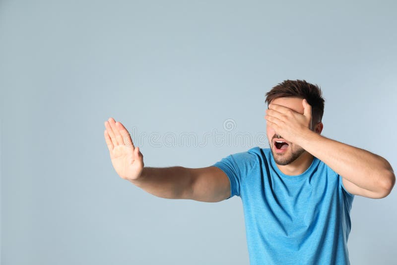 Young Man Being Blinded On Grey Stock Image - Image of anxiety, fear ...