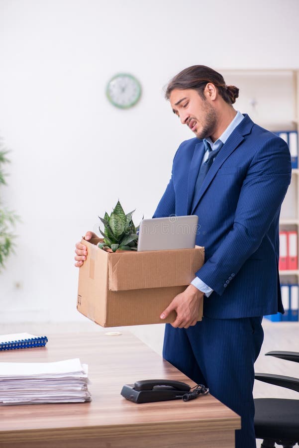 Young Man Being Fired from His Work Stock Image - Image of belongings ...