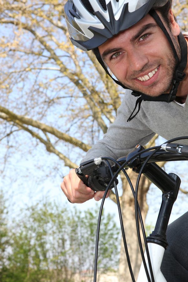 Young man on bicycle stock image. Image of activity, girl - 29385253