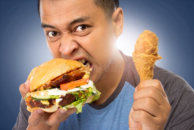 Young Man Bite His Big Burger Stock Image - Image of handsome ...