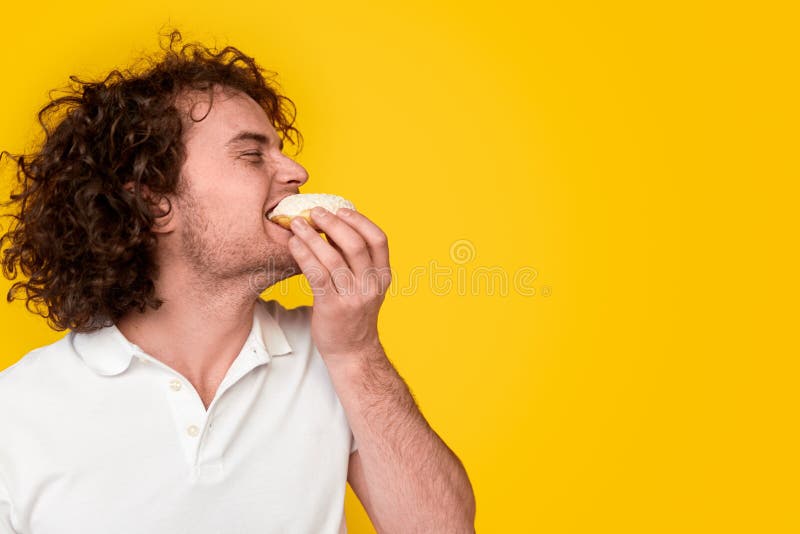 Man Biting Fresh Doughnut Stock Photos - Free & Royalty-Free Stock ...